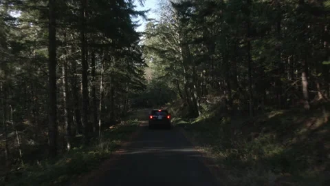 View From Behind of a Car Driving on a R... | Stock Video | Pond5