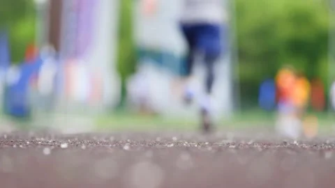 view from behind runner running with acc... | Stock Video | Pond5
