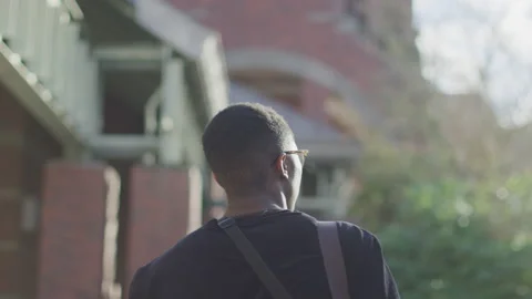 View From Behind of a Student Walking Ou... | Stock Video | Pond5