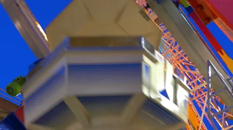 View from below of a carnival ride opera... | Stock Video | Pond5
