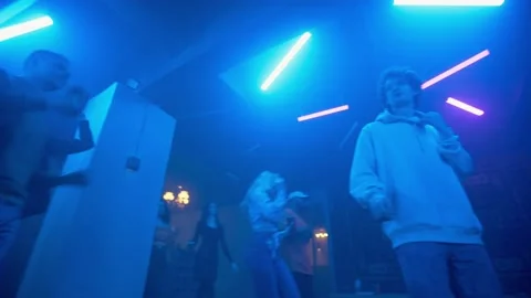View from below a crowd of people dancin... | Stock Video | Pond5