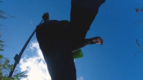 View from below a hiker stepping over an... | Stock Video | Pond5
