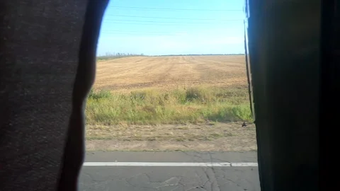 View from bus window View fields trees b... | Stock Video | Pond5
