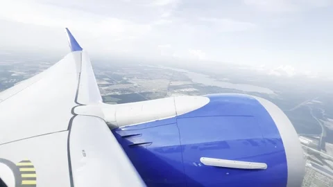View from the cabin: the engine and wing... | Stock Video | Pond5