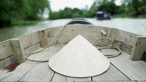 View Conical hat Sampan tourist boat Mek... | Stock Video | Pond5