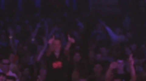 View at crowd of people clapping in nigh... | Stock Video | Pond5