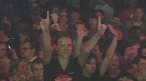 View at crowd of people clapping in nigh... | Stock Video | Pond5