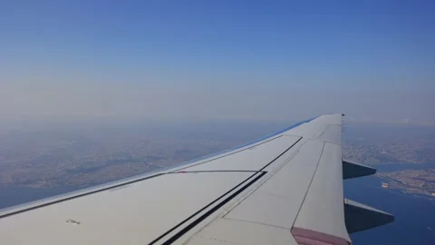 View in flight from the window porthole ... | Stock Video | Pond5