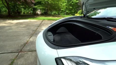 View of the front trunk in a new white T... | Stock Video | Pond5