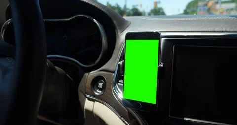 View of Green Screen Smartphone on Dashb... | Stock Video | Pond5