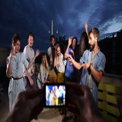 View of hands filming couple dancing in ... | Stock Video | Pond5