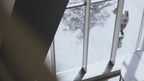 View inside the building. Young beautifu... | Stock Video | Pond5