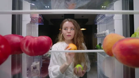 View from inside fridge - woman opens si... | Stock Video | Pond5