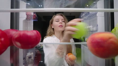View from inside fridge - woman opens si... | Stock Video | Pond5