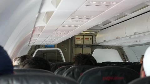 view inside plane cabin from the back wi... | Stock Video | Pond5