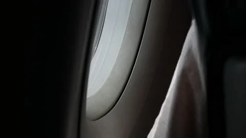 view inside plane cabin to the window wi... | Stock Video | Pond5