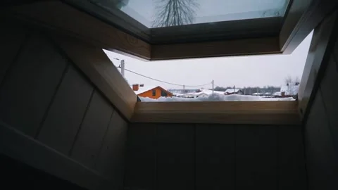 View from inside through the open dormer... | Stock Video | Pond5