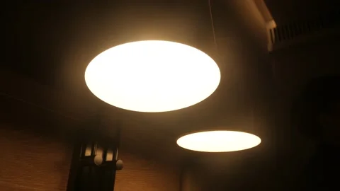 view to light bulb in overhead lamp | Stock Video | Pond5