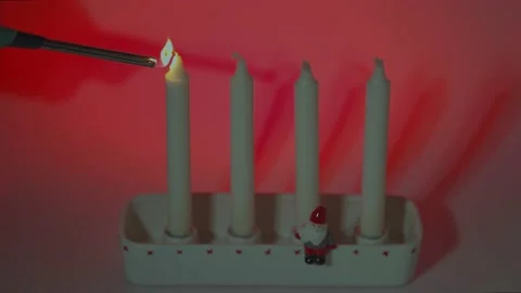 View of man lights first candle in tradi... | Stock Video | Pond5