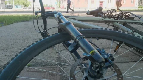View of old bicycle lying on ground and ... | Stock Video | Pond5