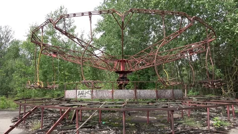 View on old rusty roundabouts turning on... | Stock Video | Pond5