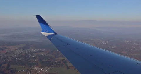 In a view out the window, an airplane wi... | Stock Video | Pond5