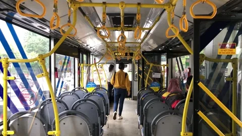View of passengers inside a moving bus o... | Stock Video | Pond5