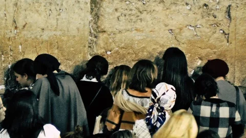 view of people praying front the wailing... | Stock Video | Pond5