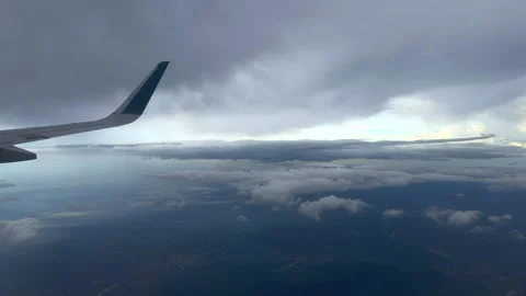 View from plane window. Flying through c... | Stock Video | Pond5