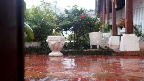 View Of Rain Falling Heavily Inside A Co... | Stock Video | Pond5