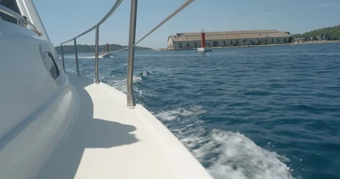 View from the side of a boat racing anot... | Stock Video | Pond5