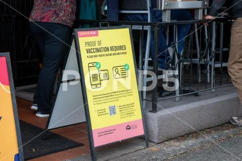 View of sign at the entrance of local restaurant BC Vaccine Card and ID ...