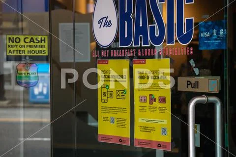 View of sign at the entrance of local restaurant BC Vaccine Card and ID ...