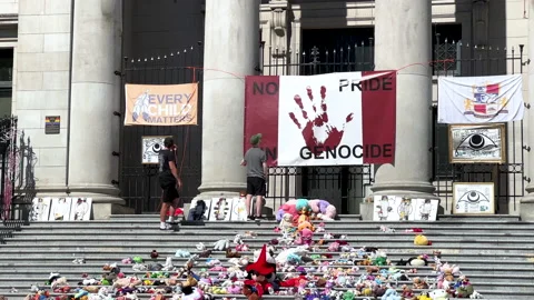View of sign No Pride in Genocide in fro... | Stock Video | Pond5