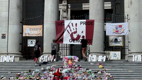 View of sign No Pride in Genocide in fro... | Stock Video | Pond5