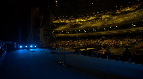 View from the stage of people walking in... | Stock Video | Pond5