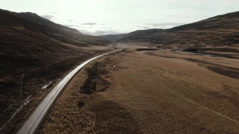 View at straight road in middle of valle... | Stock Video | Pond5