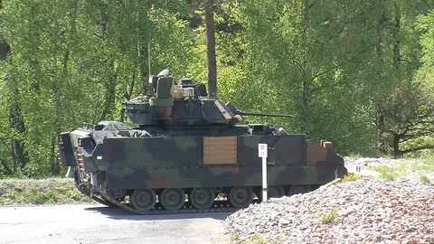 View of the tank operator using the mach... | Stock Video | Pond5