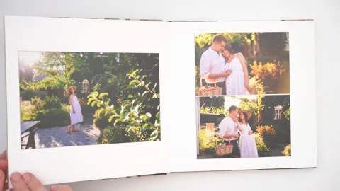 view top. flips through photo book from ... | Stock Video | Pond5