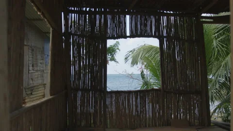 View of Tropical Ocean From Inside Bambo... | Stock Video | Pond5