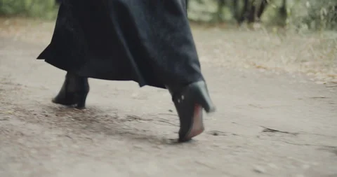 View of woman feet in black shoes walk t... | Stock Video | Pond5