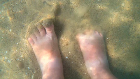 View woman feet digging toes into sand B... | Stock Video | Pond5