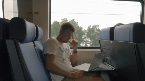 View of young man riding in the train an... | Stock Video | Pond5