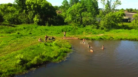 Village Boys Swimming Stock Videos – Royalty-Free HD & 4K Videos | Pond5