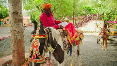 Villager wears traditional clothes strug... | Stock Video | Pond5