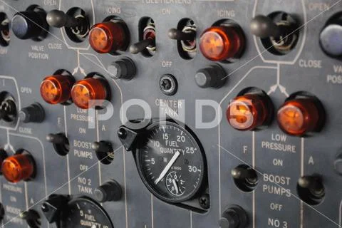 Photograph: Vintage Airplane Cockpit with Control Panel and Instruments ...