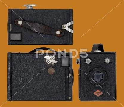 Vintage camera box photo cameras orange background Stock Image #102907736