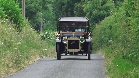 Vintage car on a tour of the lanes of Ir... | Stock Video | Pond5