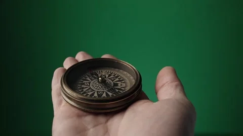 Vintage compass with a rotating arrow in... | Stock Video | Pond5