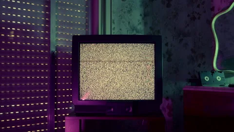 Vintage CRT TV with Static and VHS Tapes... | Stock Video | Pond5